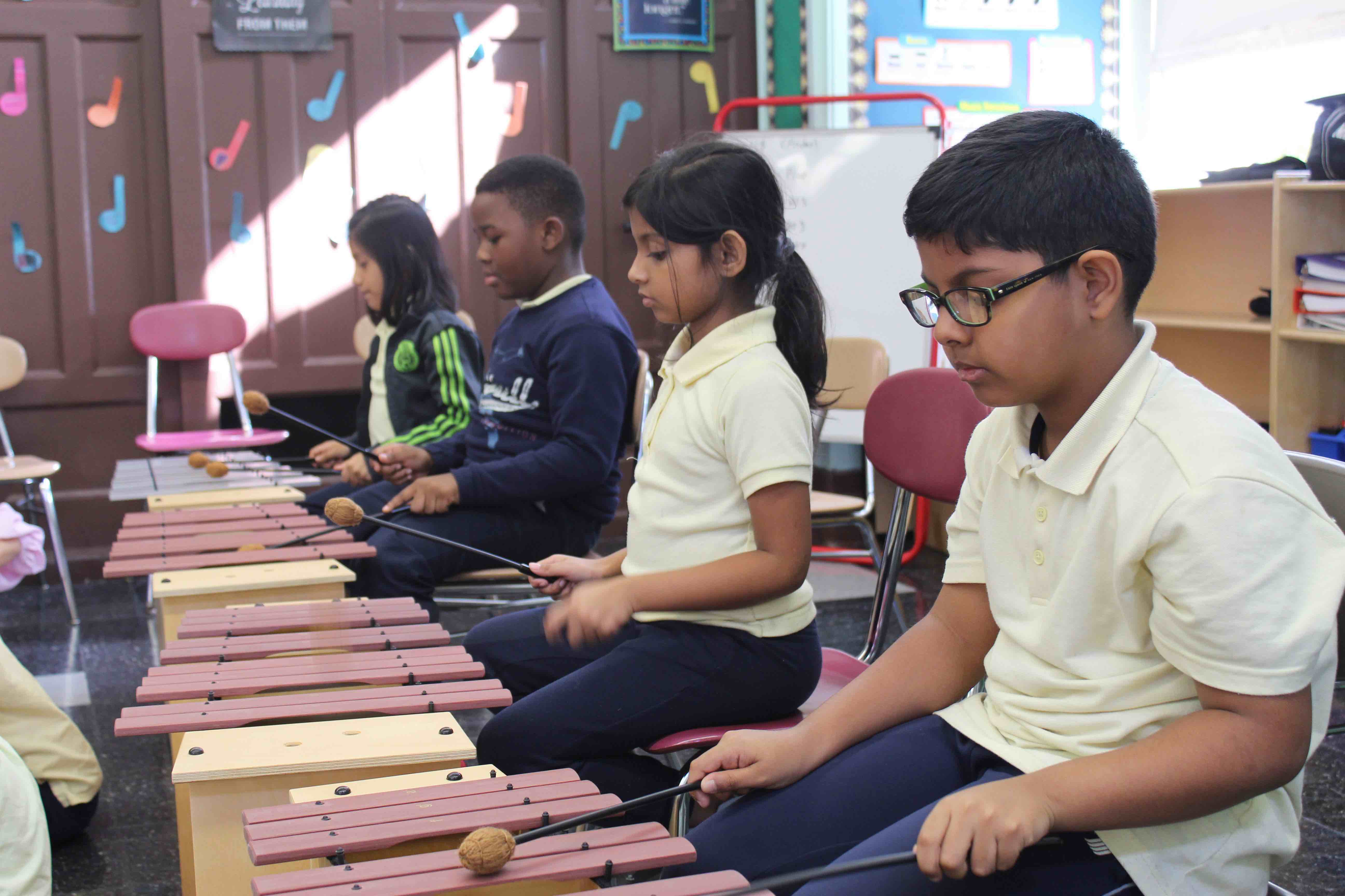 Students holding instruments